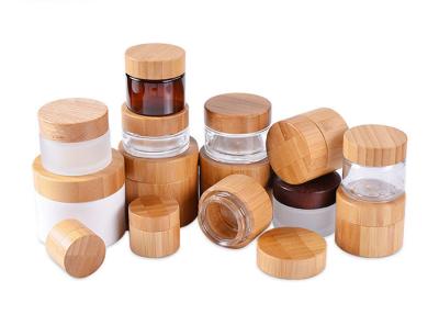 China 5grams Amber Glass Cosmetic Jar Glass Lip Balm Containers With Bamboo Screw Lid for sale
