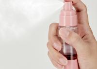 China UV Plating 100ML Cosmetic Airless Bottle Transparent With Pink Spray Pump for sale