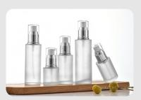 China 1 Ounce Glass Spray Cosmetic Pump Bottle With Silver Caps User Friendly for sale