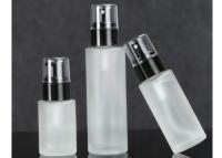 China 1 Ounce Glass Spray Cosmetic Pump Bottle With Silver Caps User Friendly for sale