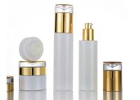 China Acrylic Gold Caps Pearl White Cosmetic Pump Bottle 100ml Custom Logo Print for sale