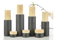 China Black Frosted 5ml - 200ml Glass Cosmetic Pump Bottle Eco Friendly Leak Free for sale