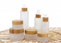 China JIAZI Bamboo Cap Cosmetic Pump Bottles Jars Set 20ml -120ml Multi Color for sale