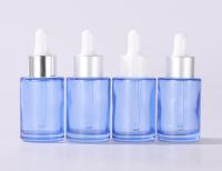 China Clear Frosted Dropper Bottles 30ml Face Serum Blue Bottle Thick Bottom for sale