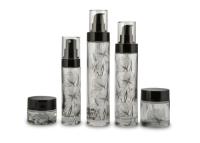 China Dustproof 100ml Hair Oil Bottle Round Makeup Pump Bottle With Black Caps for sale