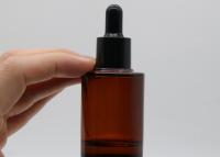 China Recyclable 20ml Dropper Bottle , Amber Glass Cosmetic Bottles UV Coating for sale