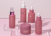 China Pink Frosted Empty Cosmetic Bottles Leak Free 50ml Cream Bottle for sale