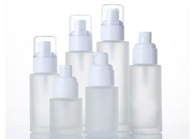 China Clear Frosted Glass Serum Pump Bottles 50ml 100ml Empty Skincare Bottles for sale
