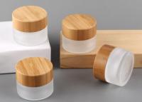 China Luxury Cream Frosted Glass Cosmetic Jar 15g With Wooden Lids 42cm Wide for sale