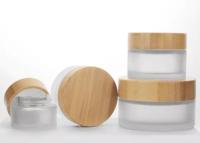 China 50g Bamboo Lid Cosmetic Jar , Glass Face Cream Jars Wear Resisting for sale