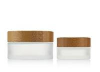 China Recyclable 30g-100g White Glass Cosmetic Jar With Bamboo Lid Round for sale