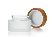 China Recyclable 30g-100g White Glass Cosmetic Jar With Bamboo Lid Round for sale