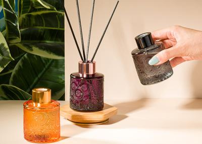 China Embossed Colored Amber Reed Glass Diffuser Bottle 6.5cm *8.5cm for sale