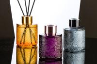 China Embossed Colored Amber Reed Glass Diffuser Bottle 6.5cm *8.5cm for sale