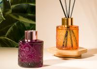 China Embossed Colored Amber Reed Glass Diffuser Bottle 6.5cm *8.5cm for sale