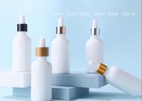 China Opal White Porcelain Ceramic 30ml 50ml Glass Dropper Bottle With Bamboo Cap for sale