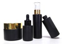 China 1 Oz Transparent Empty Cosmetic Glass Serum Matte Dropper Bottles With Paper Tubes for sale