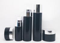 China 40 Ml Gift Packaging Black Frosted Glass Lotion Pump Bottle With Silver Caps for sale