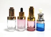 China Cosmetic Essential Round Transparent 1 Oz Empty Hair Oil Bottles With Dropper for sale