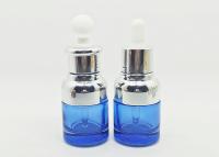 China Cosmetic Essential Round Transparent 1 Oz Empty Hair Oil Bottles With Dropper for sale