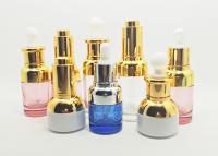 China Cosmetic Essential Round Transparent 1 Oz Empty Hair Oil Bottles With Dropper for sale