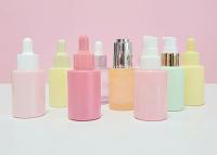 China Matte Pink Flat Shoulder 30ml Frosted Glass Dropper Bottles With Pump for sale