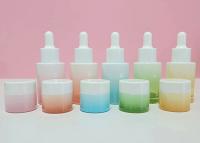 China Matte Pink Flat Shoulder 30ml Frosted Glass Dropper Bottles With Pump for sale