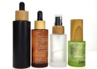 China Empty Paper Tube Cosmetic Packaging Glass Dropper Bottles Black 2oz for sale