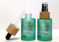 China Empty Paper Tube Cosmetic Packaging Glass Dropper Bottles Black 2oz for sale