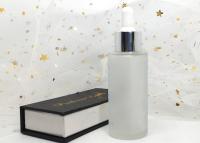 China Empty Cosmetic 20 Ml Frosted Glass Hair Oil Packaging Bottles Wih Paper Tubes for sale