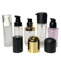 China 30ml 1oz Mixed Colour Glass Essential Bottle With Pump Luxury Skincare Packaging for sale