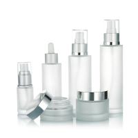 China 80ml Cosmetic Packaging Containers Face Cream Glass Bottle Set With Dropper Spray Lid for sale