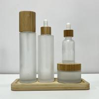 China Matte Bamboo Glass Bottle 20ml 30ml Glass Pump Spray Makeup Dropper for sale