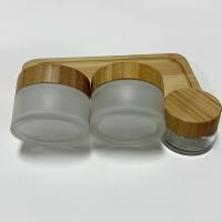 China 5g To 100g Frost Transparency Glass Cream Jar Wooden Lids Screw Mouth for sale