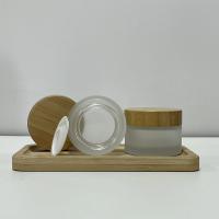 China 5g To 100g Frost Transparency Glass Cream Jar Wooden Lids Screw Mouth for sale