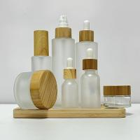 China 5g To 100g Frost Transparency Glass Cream Jar Wooden Lids Screw Mouth for sale