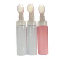 China Cosmetic Facial Cleanser 50ml 100ml 150ml Pink White Pink Pet Foam Pump Bottle With Eva Silicone Brush for sale