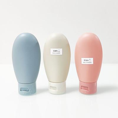 China Pink Grey Blue 60ml Plastic Cosmetic Tube For Hand Cream Smooth Body for sale