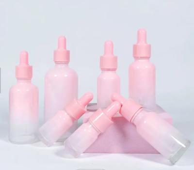 China Round Luxury Serum Gradient Pink Glass Eye Dropper Bottle 5ml 10ml 15ml 30ml 100m for sale