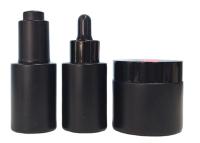 China Empty Custom Blue Frosted Push Button Serum Dropper Bottle With Lids for sale