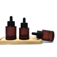 China Logo Silk Print Glass Cosmetic Bottles Flat Shoulder Empty Serum Bottle With Droppe for sale