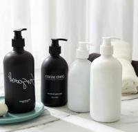 China Custom Printing 250ml 8oz Matte Black White Boston Round Empty Cosmetic Glass Shampoo Pump Lotion Bottle for sale