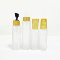 China Custom Printing 250ml 8oz Matte Black White Boston Round Empty Cosmetic Glass Shampoo Pump Lotion Bottle for sale
