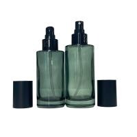 China Small Green Cosmetic Glass Lotion Bottles 40ml 50ml 100ml 150ml for sale