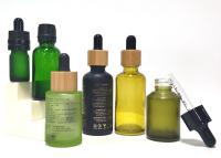 China Luxury Black Frosted Cosmetic Empty Bottles 30 Ml Glass For Foundation for sale
