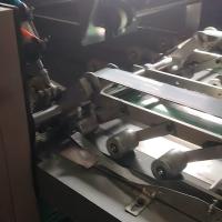 China Automatic Plastic Woven Bags Hot And Cold Integrated Sewing Machine for sale