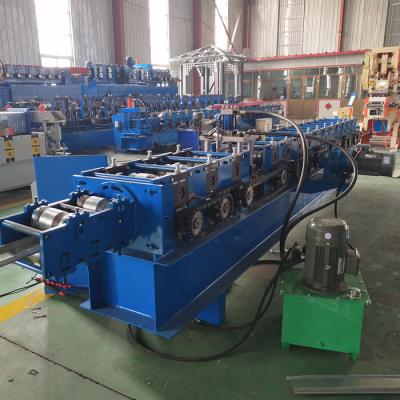 China 0.8mm Automatic Roller Shutter Door Roll Forming Machine Chain Driven for sale
