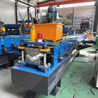 China Color Steel Tile Roof Ridge Cap Roll Forming Machine PLC Control Hydraulic Cutting Steel Profile for sale