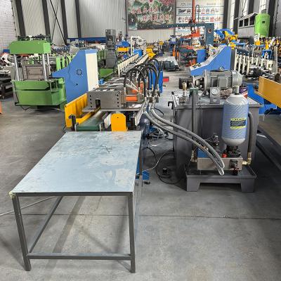China Steel Profile Customzied PLC Control 3.6m Main T Making Roll Forming Machine for sale