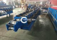 China Steel Roller Shutter Door Roll Forming Machine Security Door Machine With Holes for sale